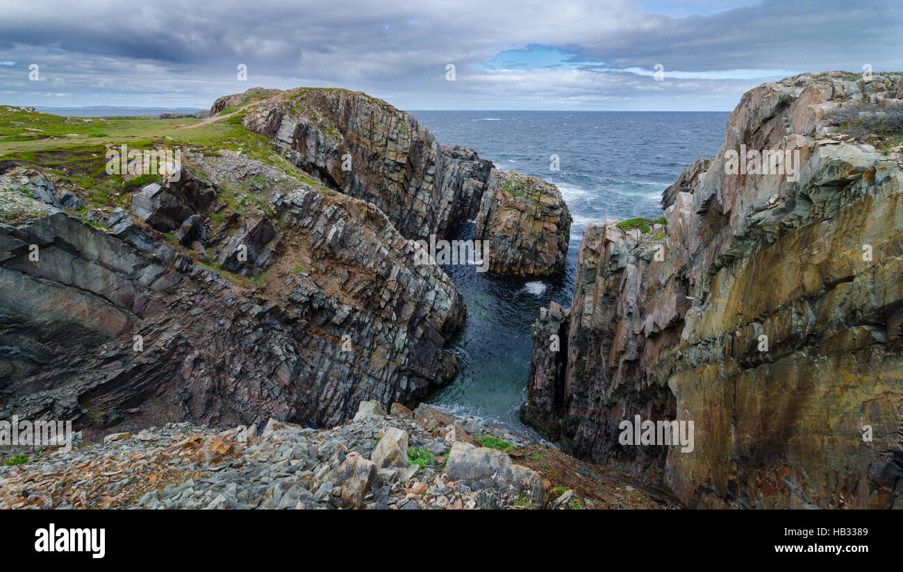 Huge rock and boulder outcrops along Cape Bonavista coastline in ...