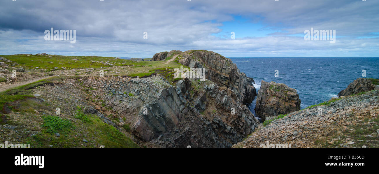 Huge rock and boulder outcrops along Cape Bonavista coastline in ...