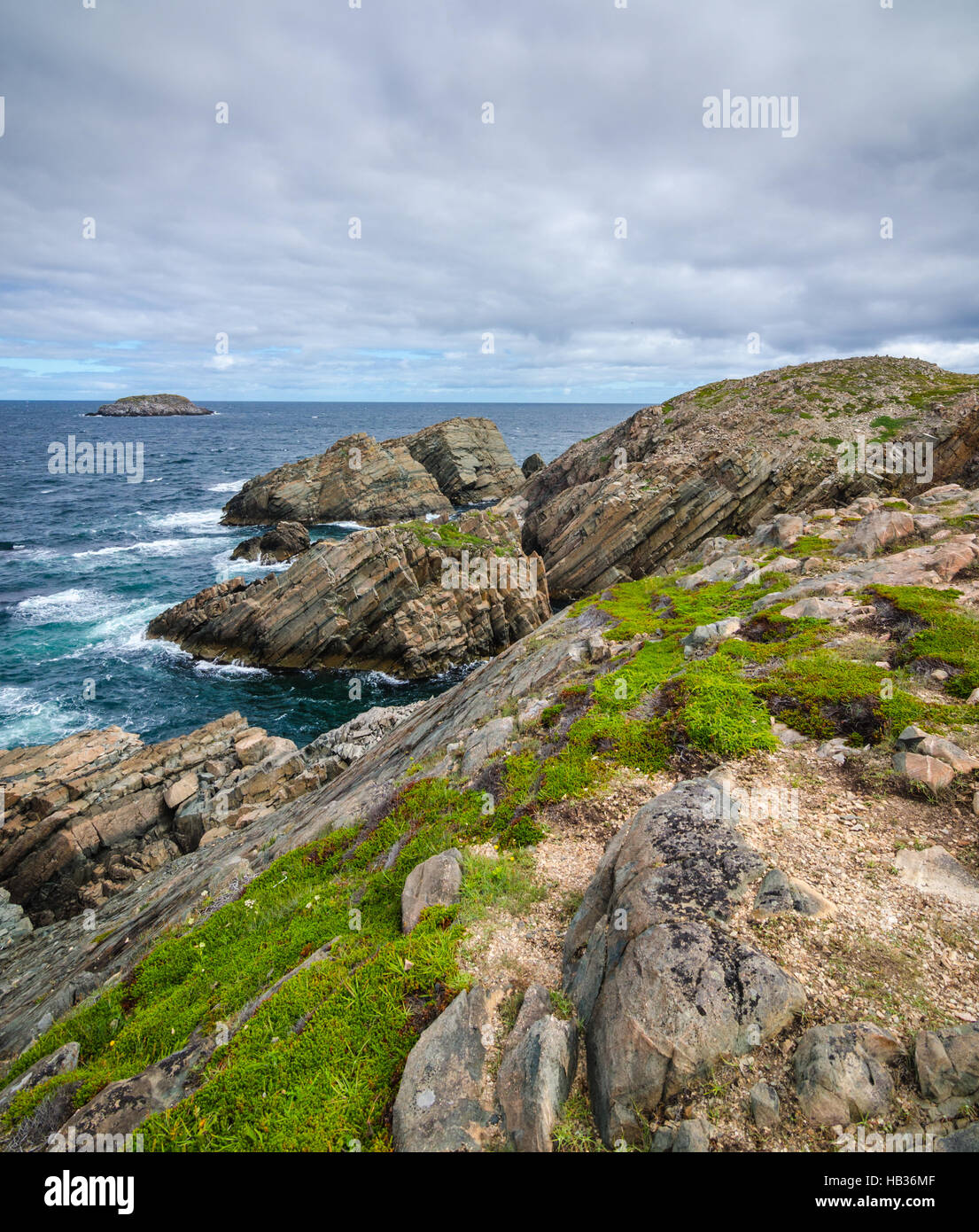 Huge rock and boulder outcrops along Cape Bonavista coastline in ...