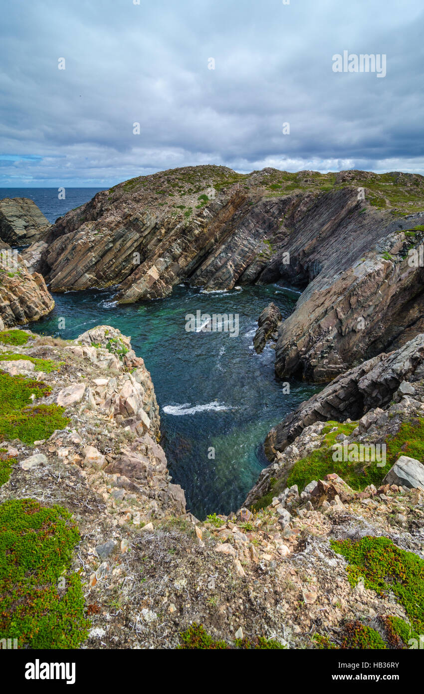 Huge rock and boulder outcrops along Cape Bonavista coastline in ...