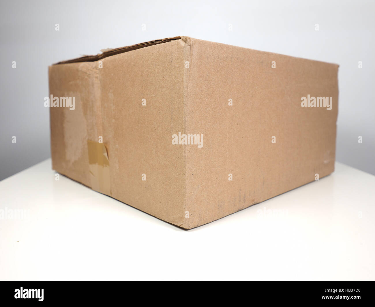 Brown packet parcel Stock Photo - Alamy