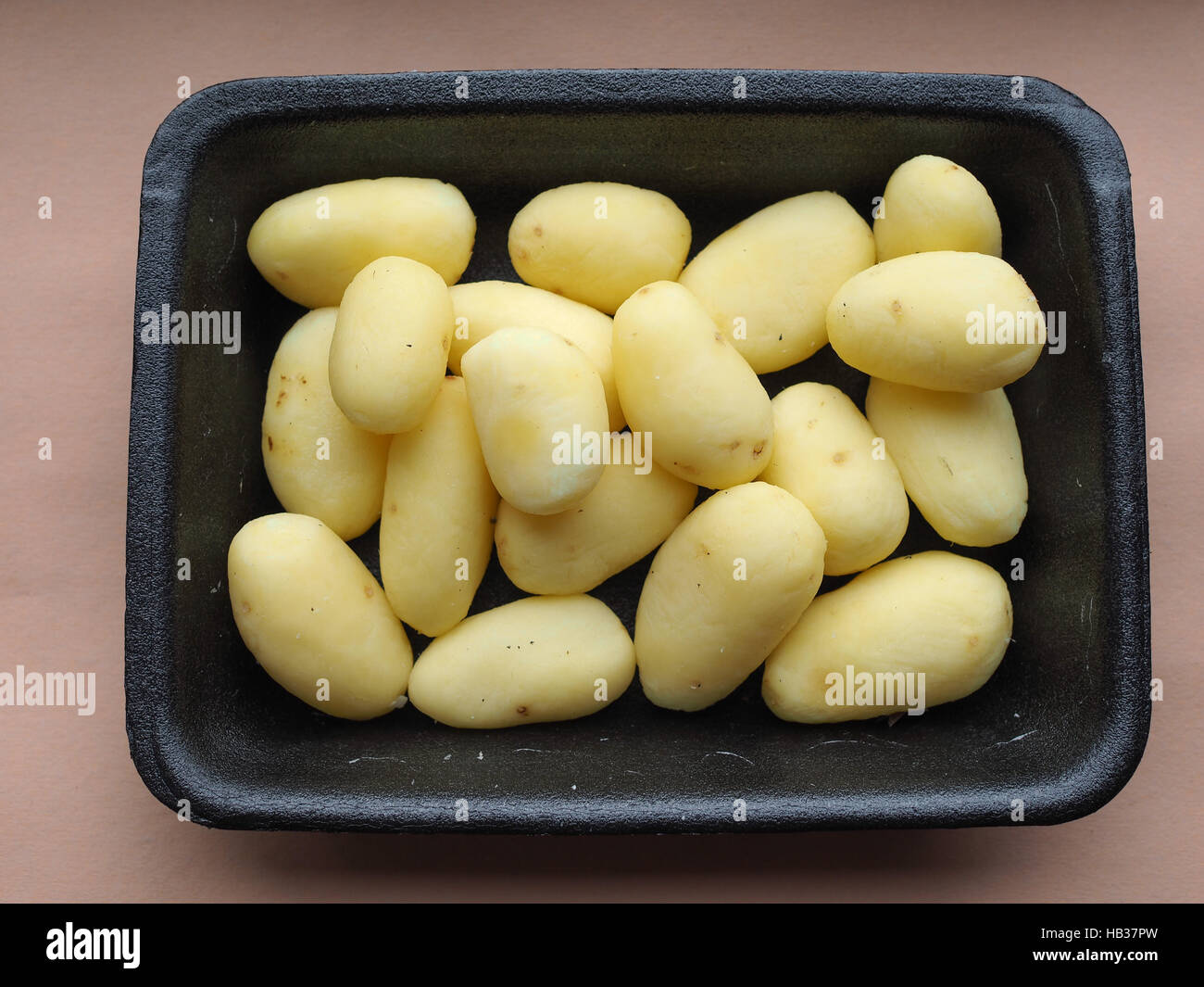 Potato vegetables in a tub Stock Photo - Alamy