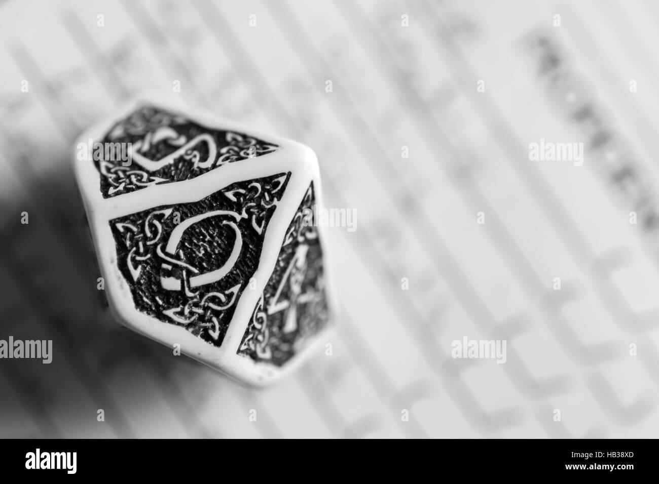Role playing die on a character sheet Stock Photo - Alamy