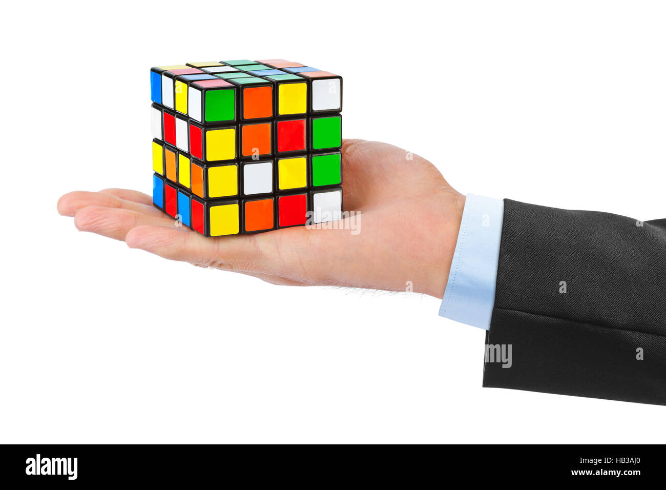 Cube puzzle in hand Stock Photo - Alamy