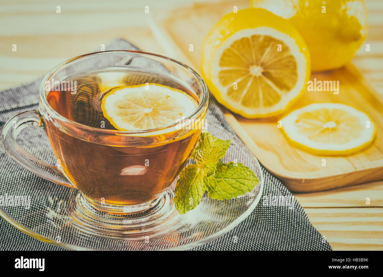 A cup of tea on the wood table. You can apply for background,backdrop ...