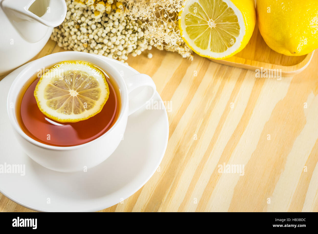 A cup of tea on the wood table. You can apply for background,backdrop ...