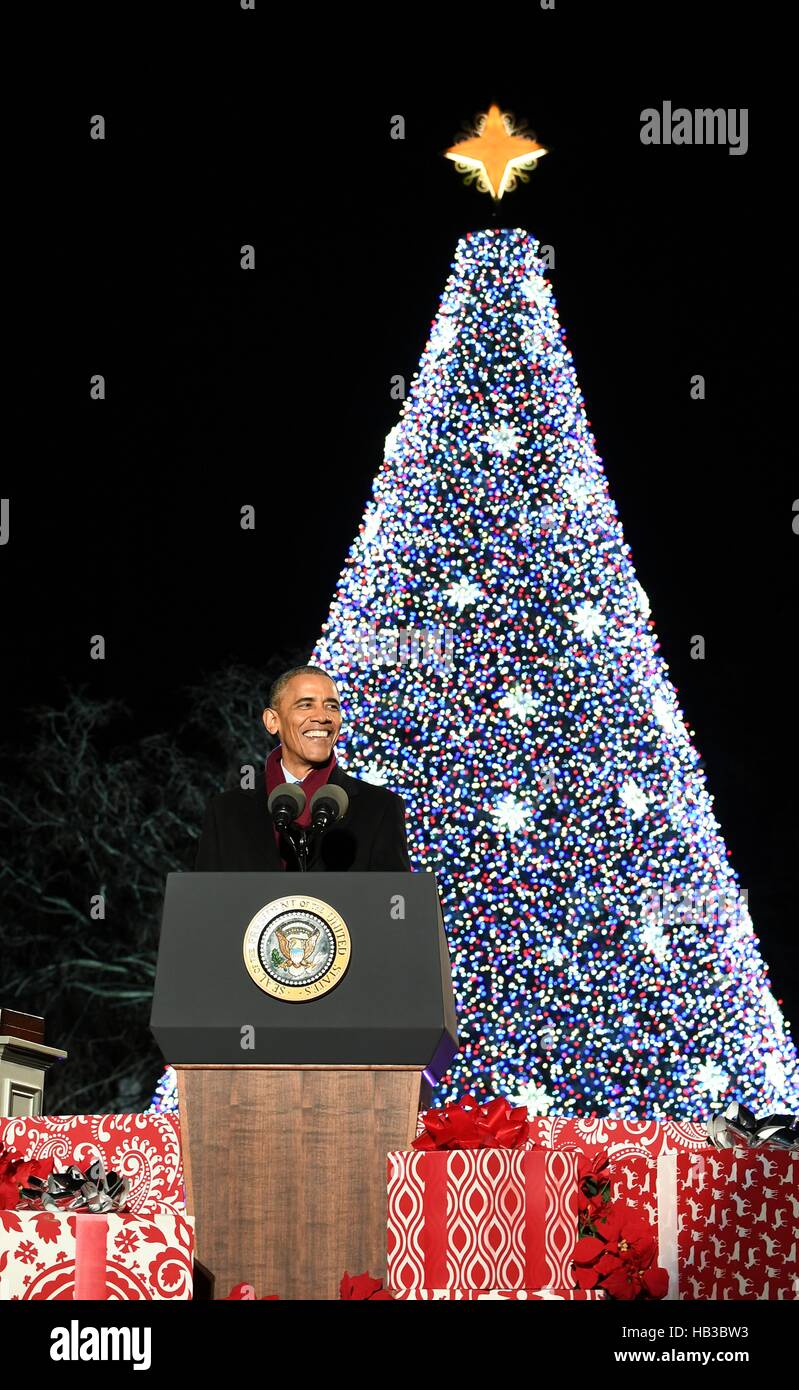 U.S President Barack Obama smiles as he lights the national Christmas ...