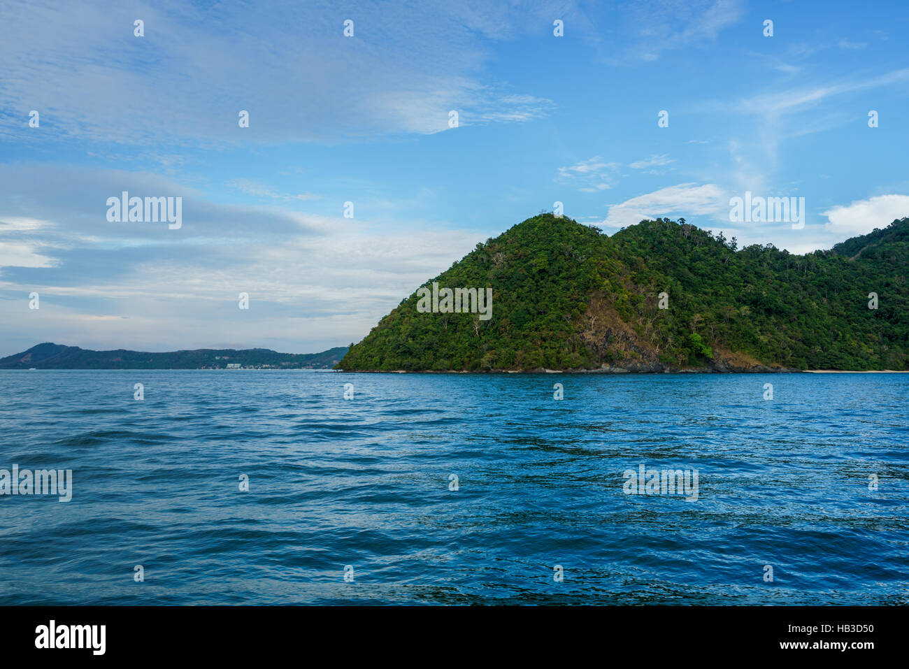 Breathtaking view of hilly island in ocean Stock Photo - Alamy