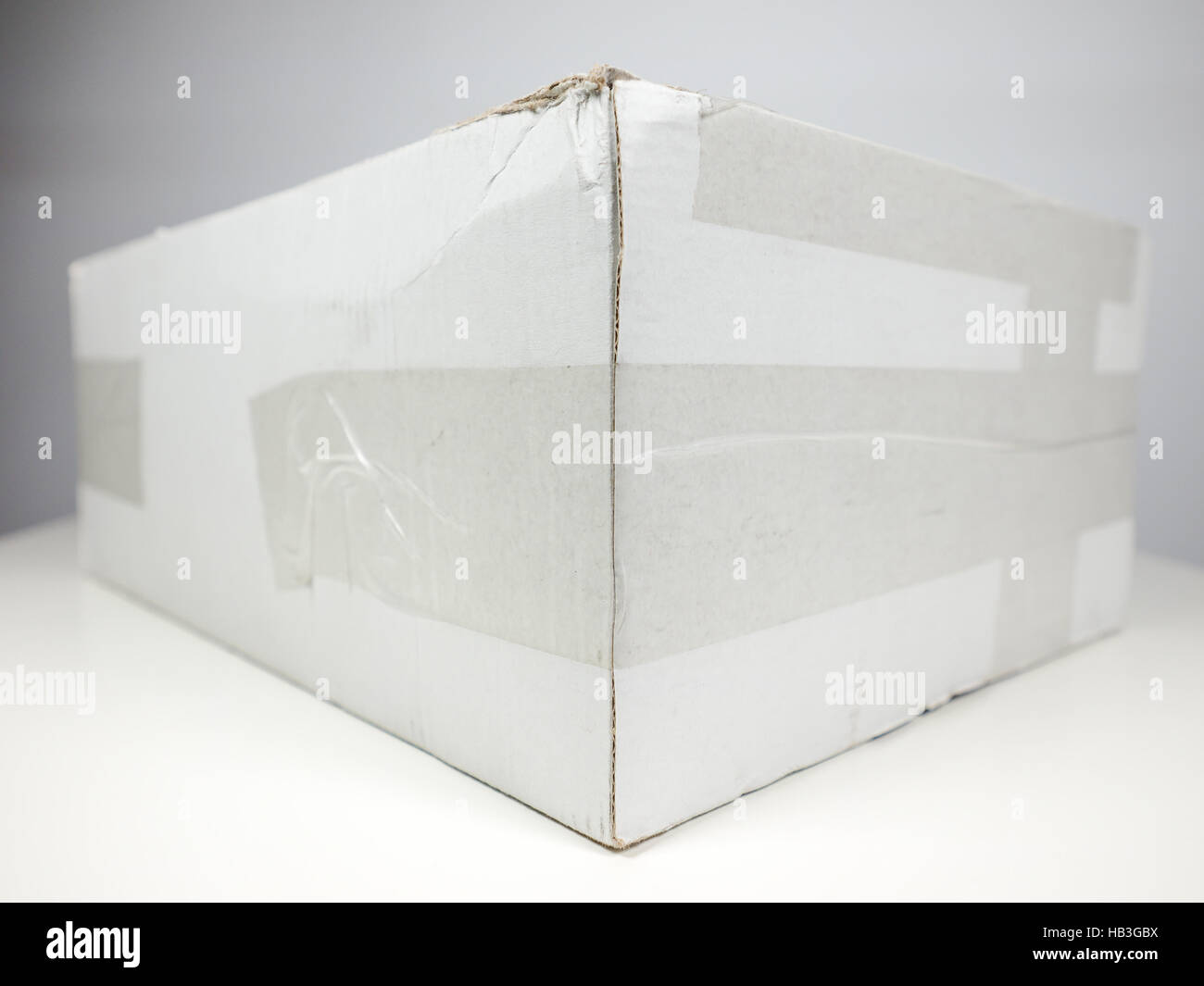 White packet parcel Stock Photo - Alamy