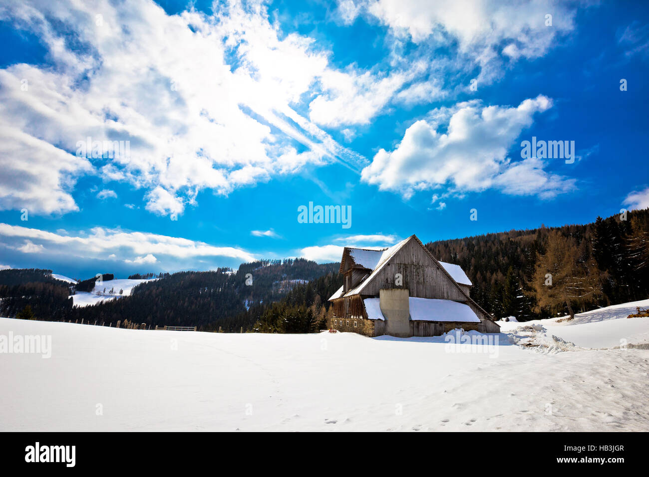 Village in Alps under deep snow Stock Photo - Alamy