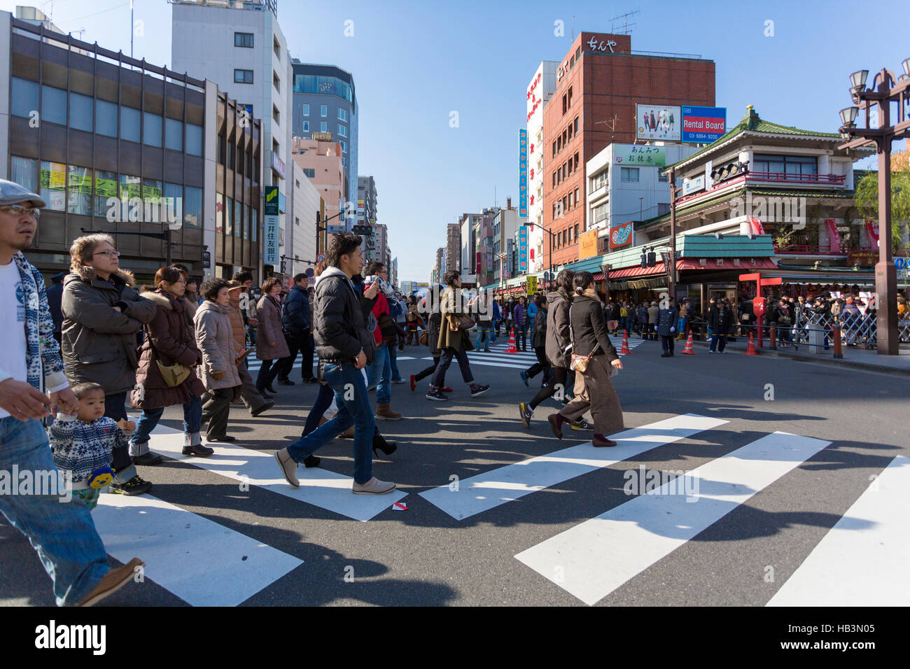 TOKYO, JAPAN - JANUARY 1: Large group of Japanese people walking in the ...