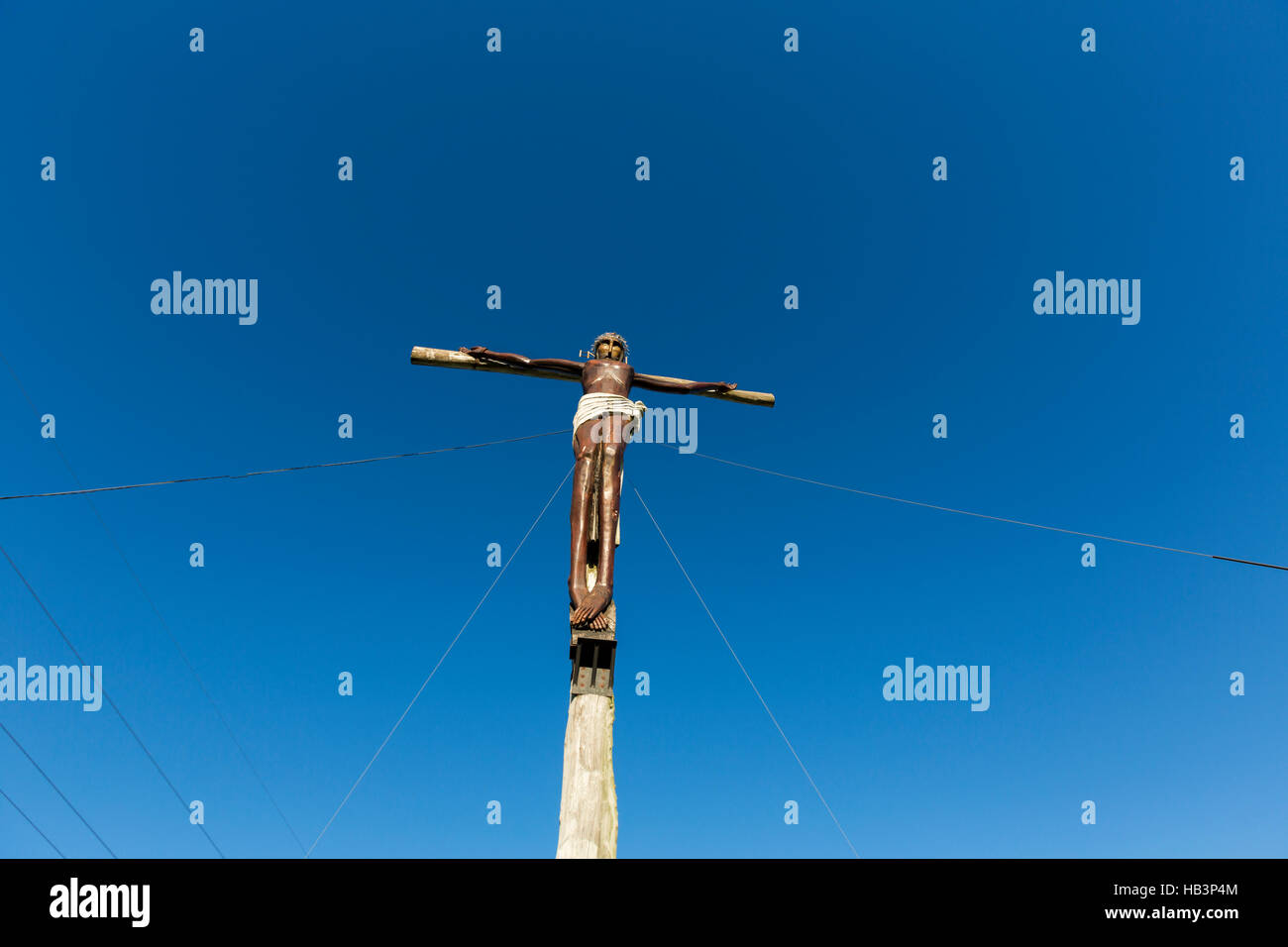 Wooden Statue of Christ and clear blue sky. Buenos Aires Stock Photo ...