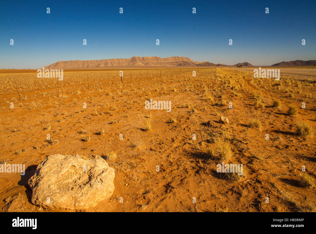 By early morning a heat haze distorts the distant mountains in the ...