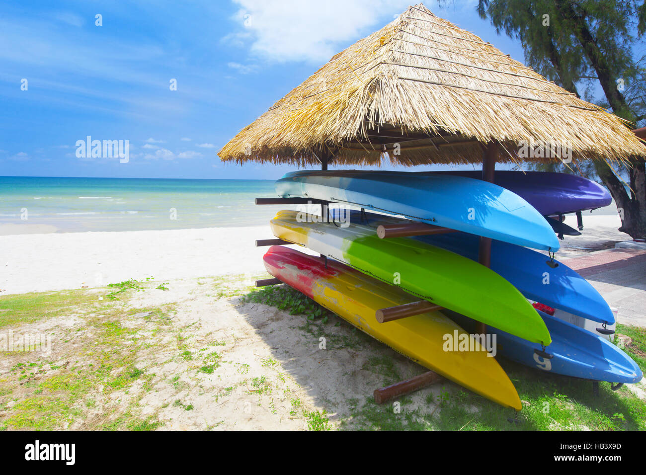 canoe Shelf on the tropical beach Stock Photo - Alamy