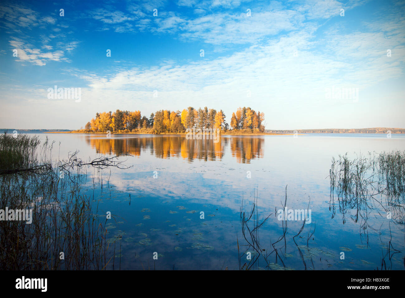 Autumn island and lake Stock Photo - Alamy