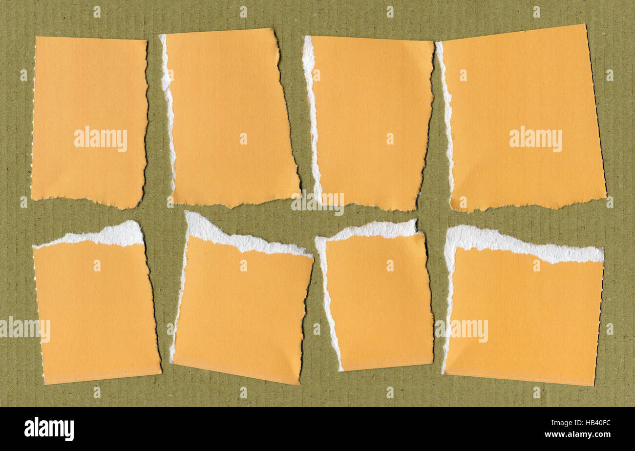 Yellow Torn paper pieces Stock Photo - Alamy