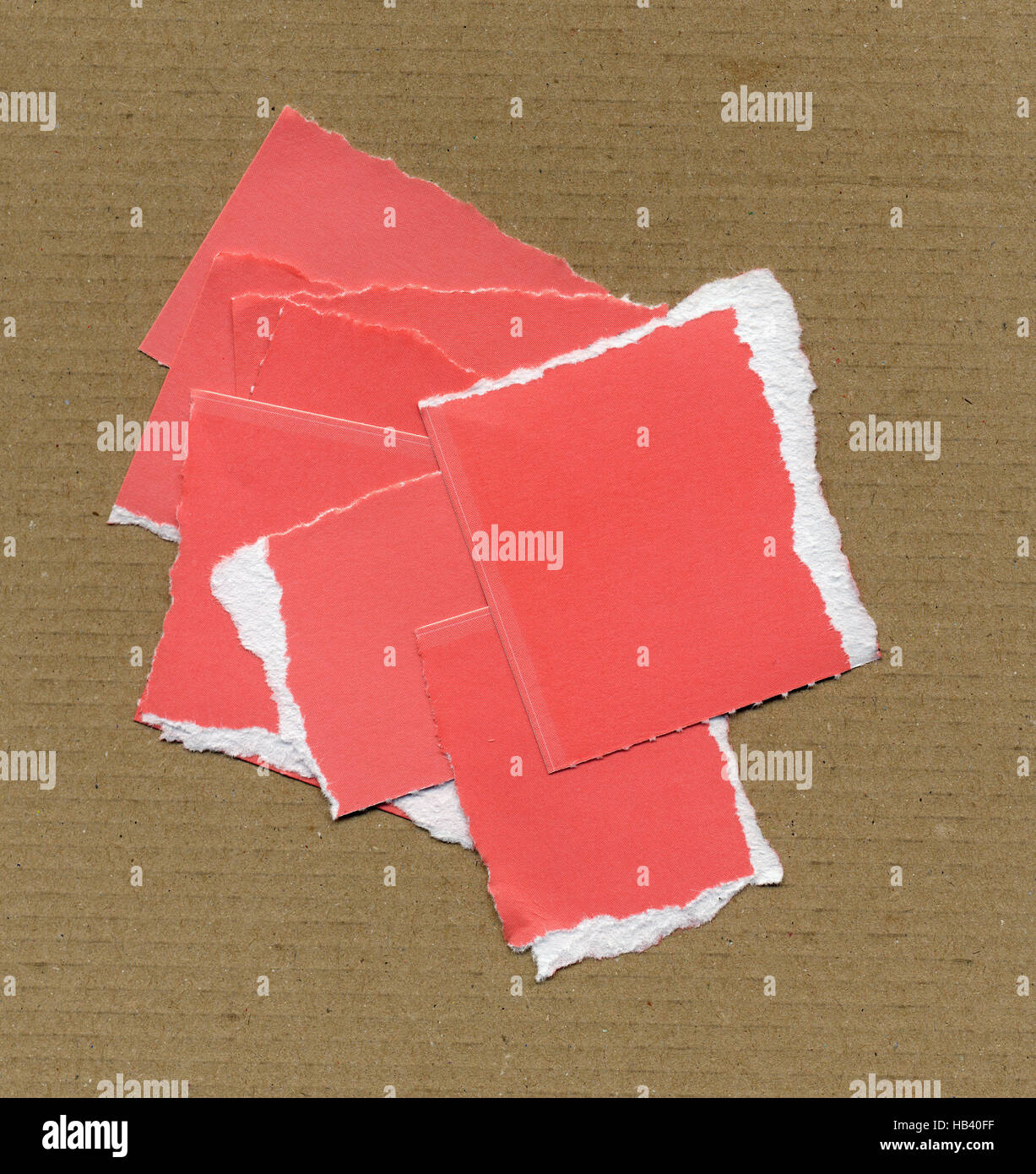 Red Torn paper pieces Stock Photo - Alamy