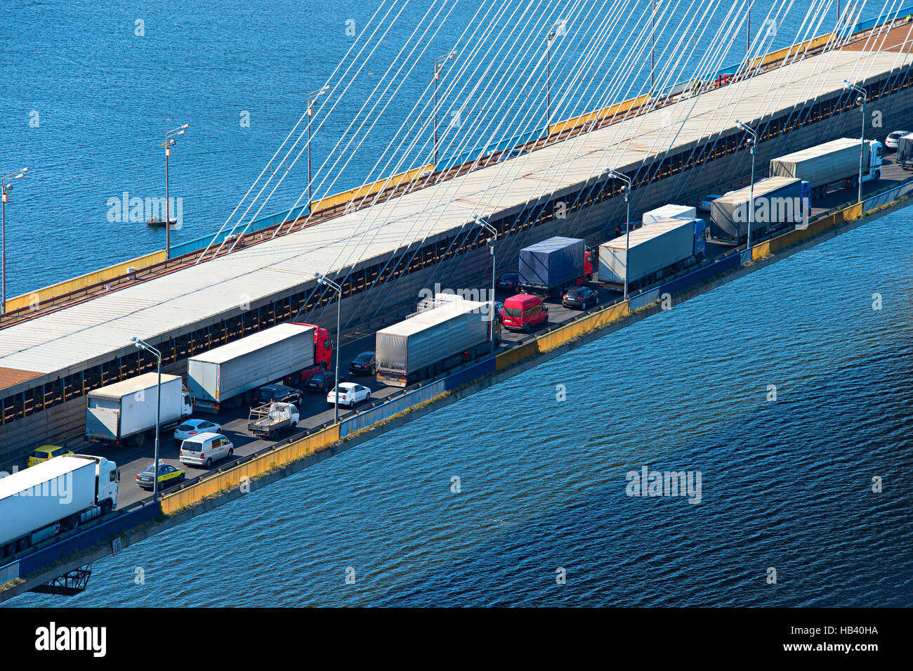 Trucks on a bridge Stock Photo - Alamy