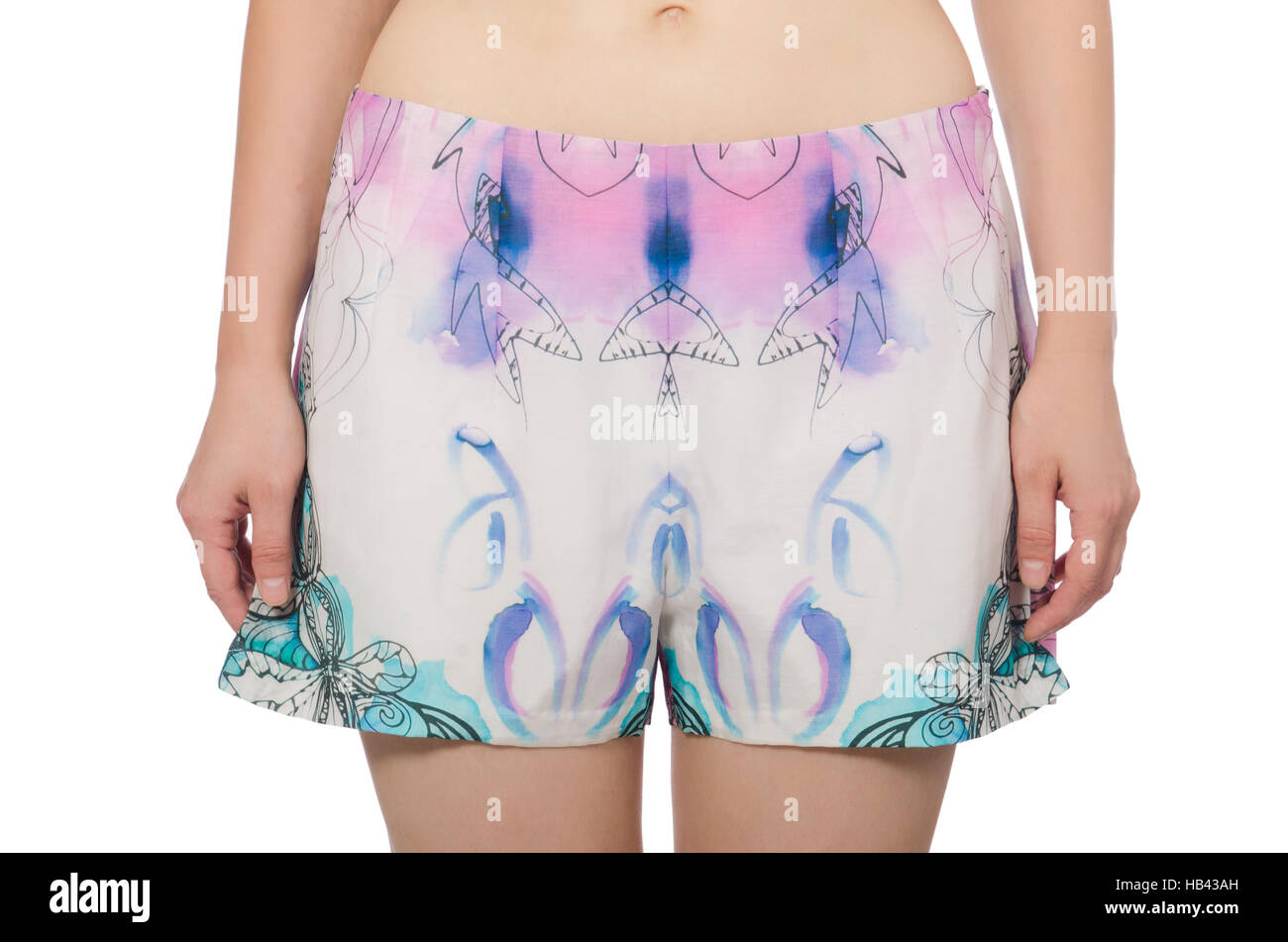 Model posing in shorts isolated on white Stock Photo - Alamy