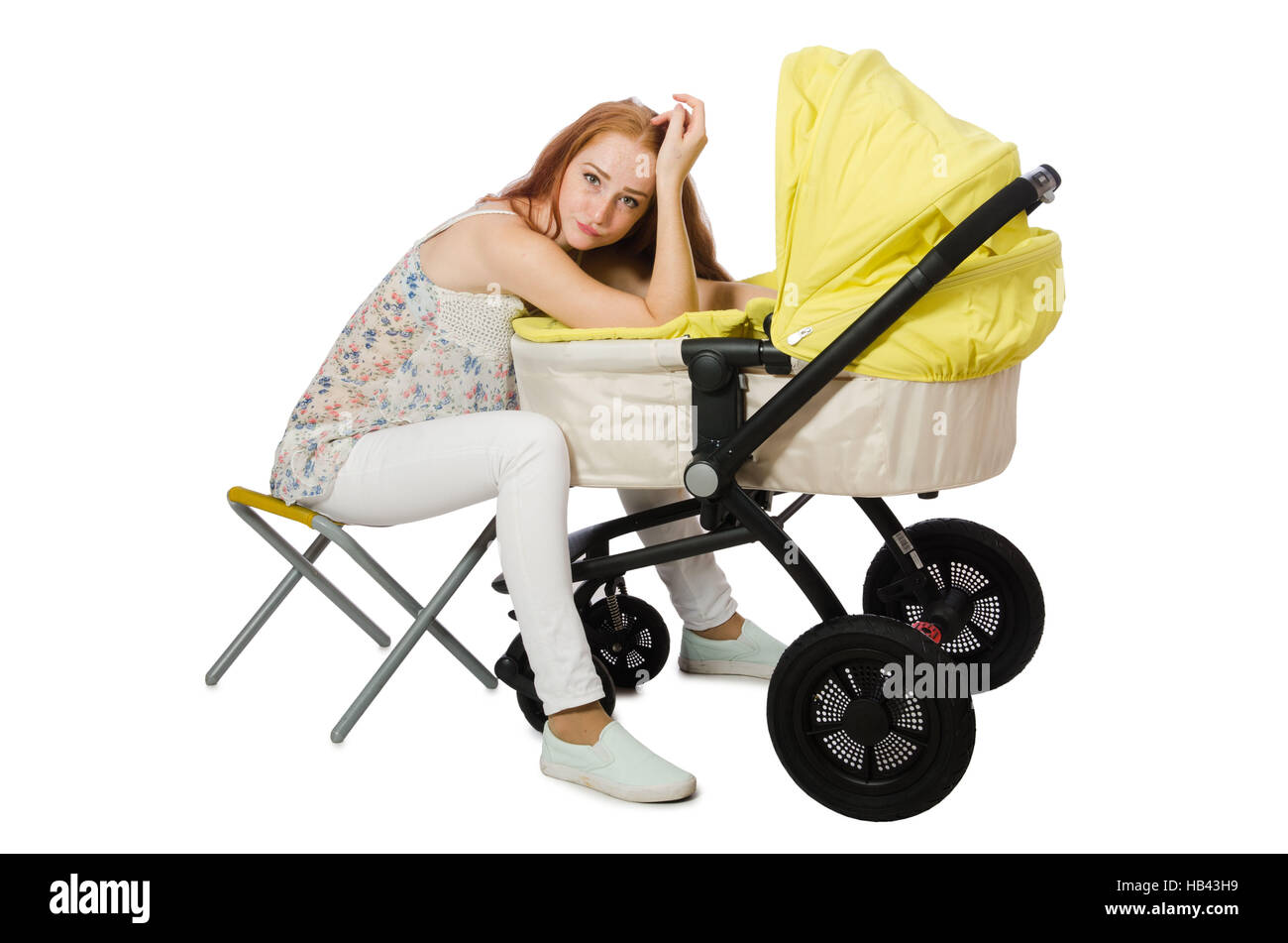 Woman with baby and pram isolated on white Stock Photo - Alamy