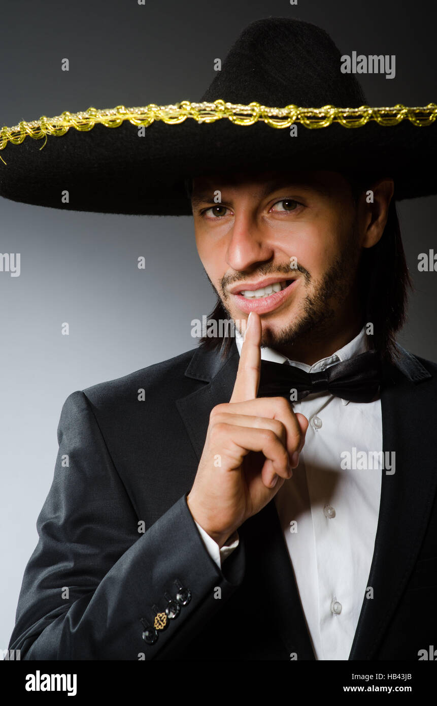 Young mexican man wearing sombrero Stock Photo - Alamy
