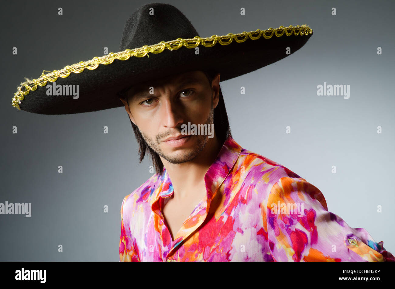 Young mexican man wearing sombrero Stock Photo - Alamy
