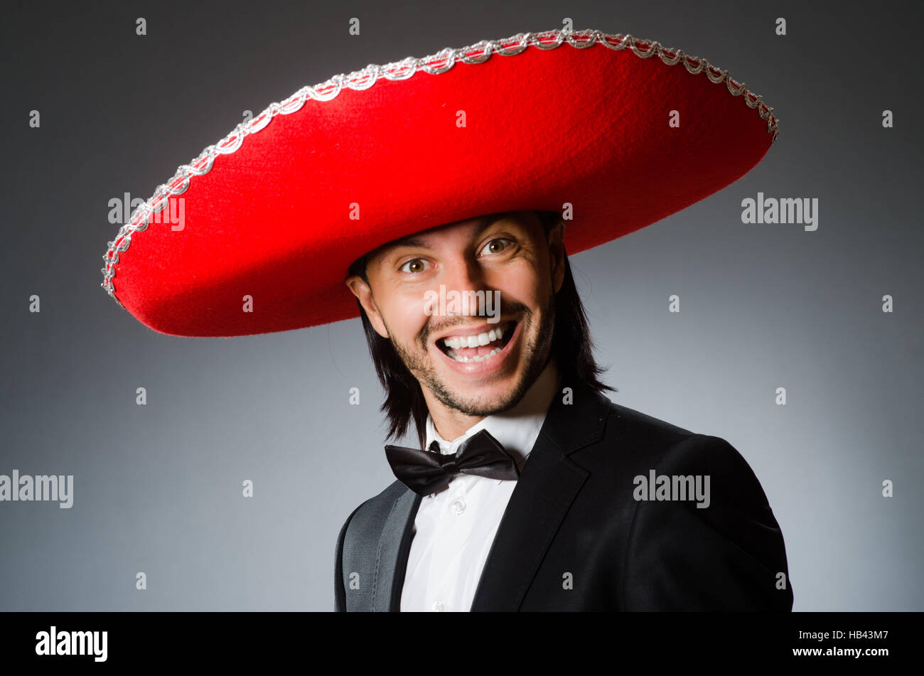 Young mexican man wearing sombrero Stock Photo - Alamy