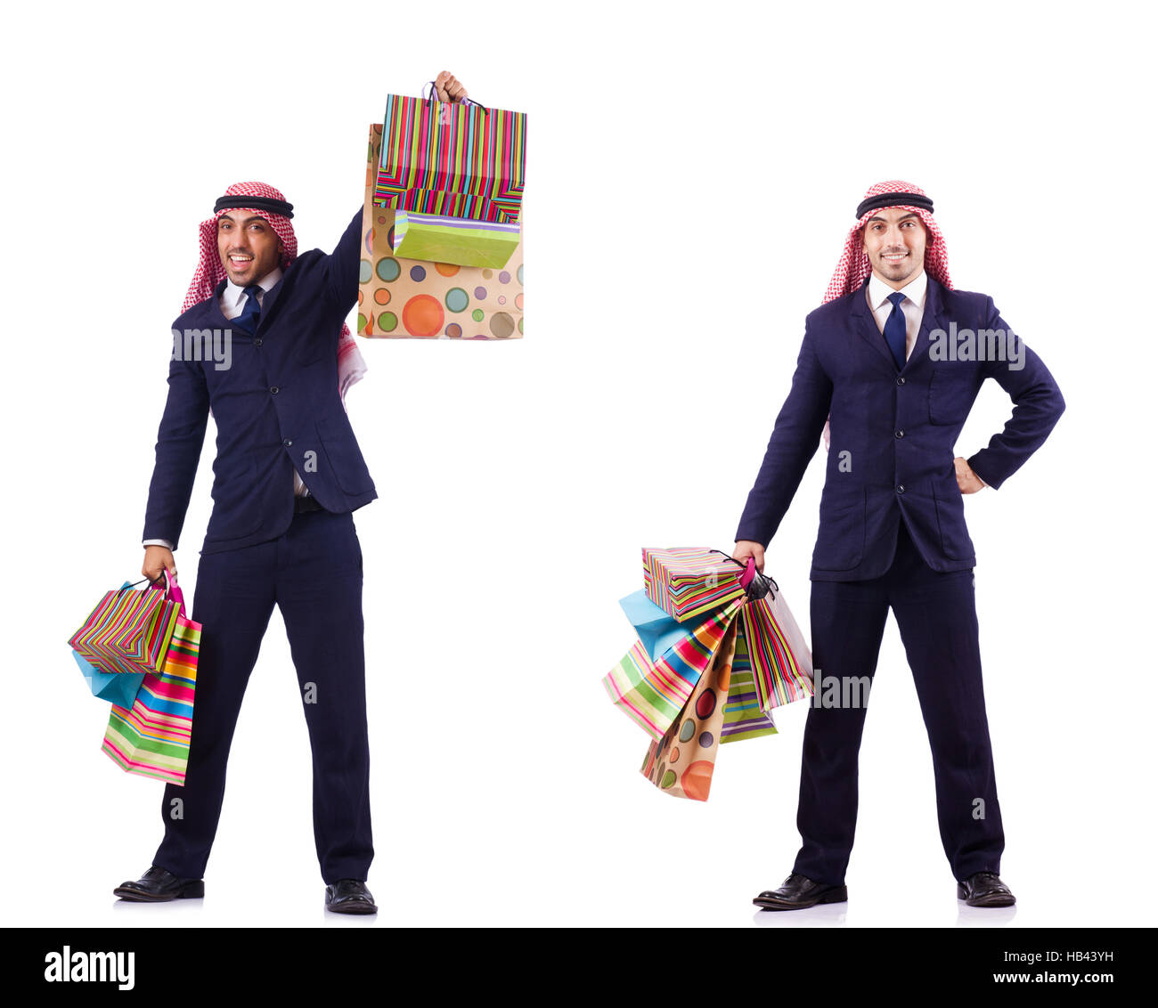 Arab man with shopping gifts on white Stock Photo - Alamy