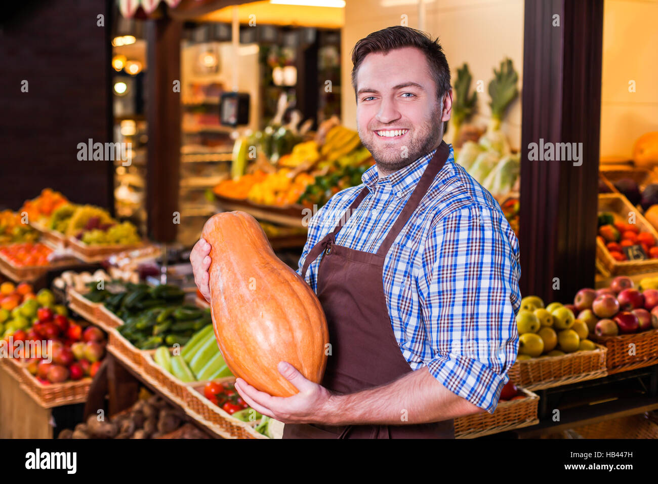 Man offers vegetables Stock Photo - Alamy