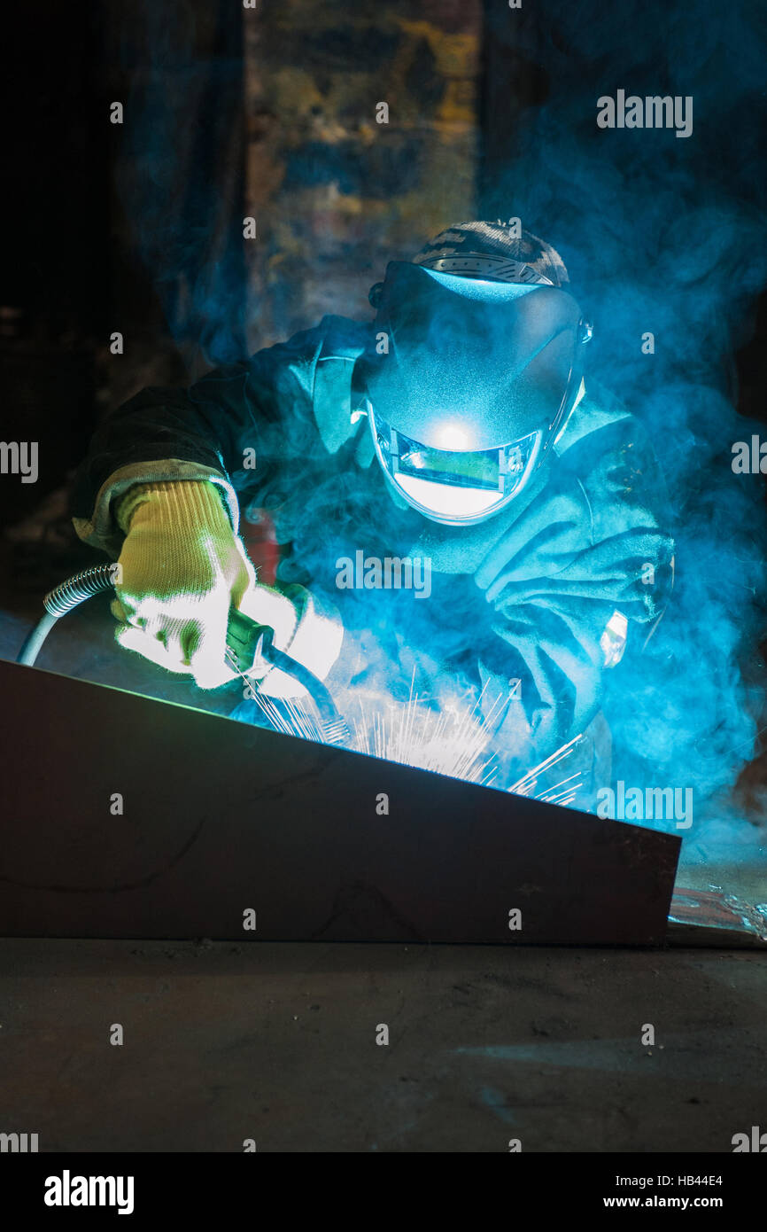 worker welding metal Stock Photo - Alamy
