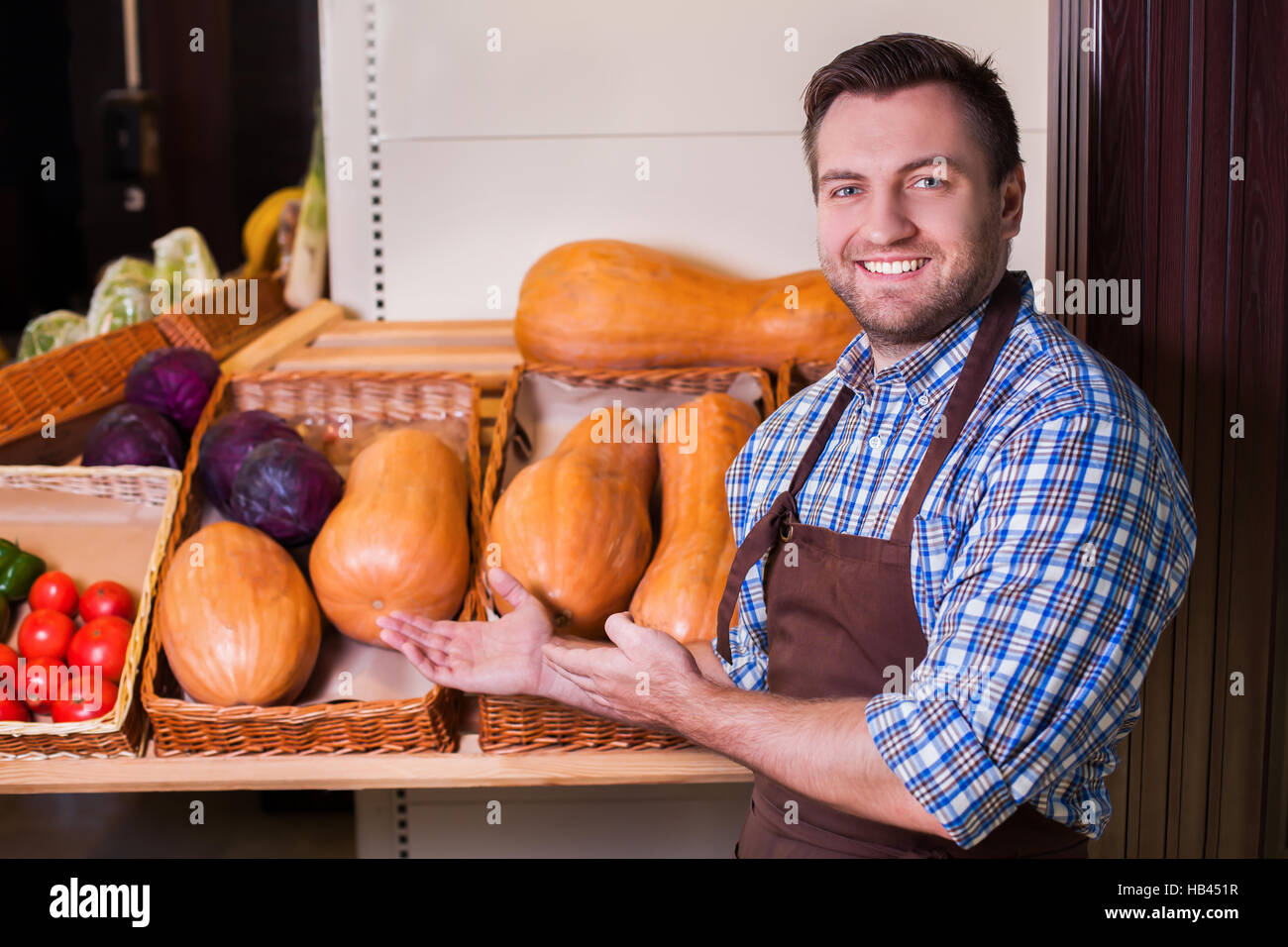 Man offers vegetables Stock Photo - Alamy