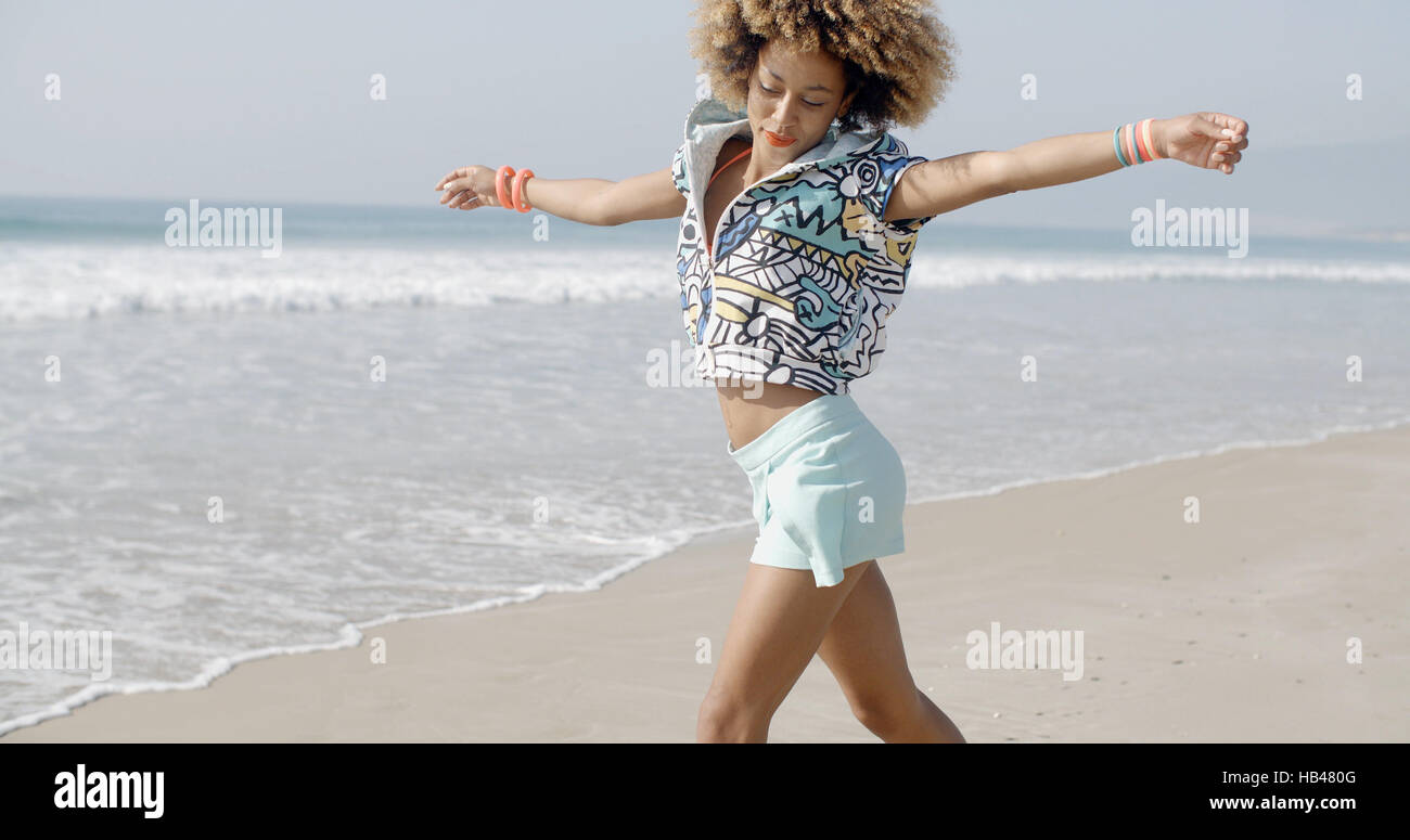 Woman dancing beach hi-res stock photography and images - Alamy
