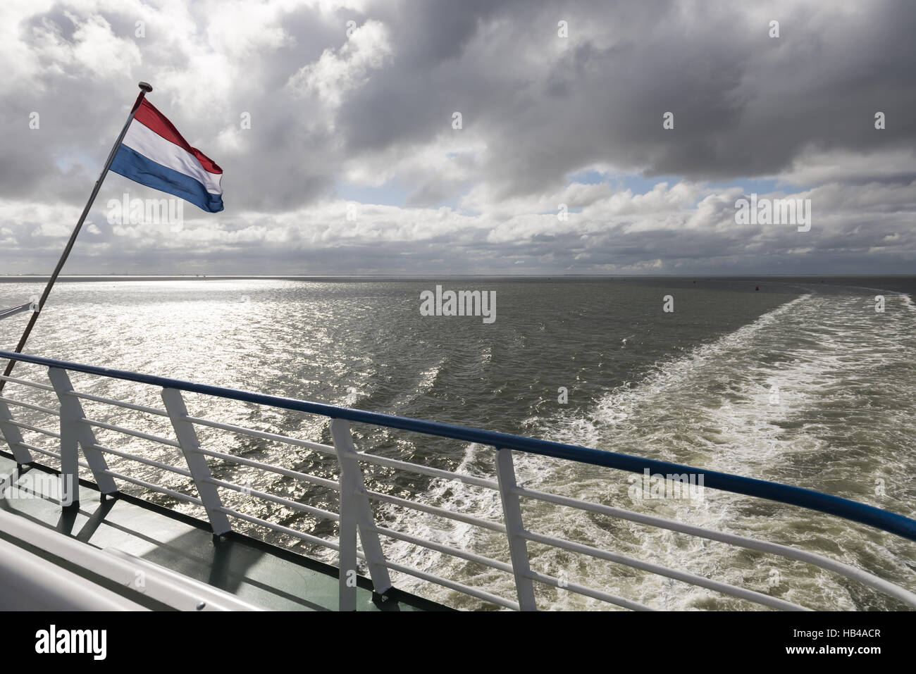 Wadden Sea with Dutch flag Stock Photo - Alamy