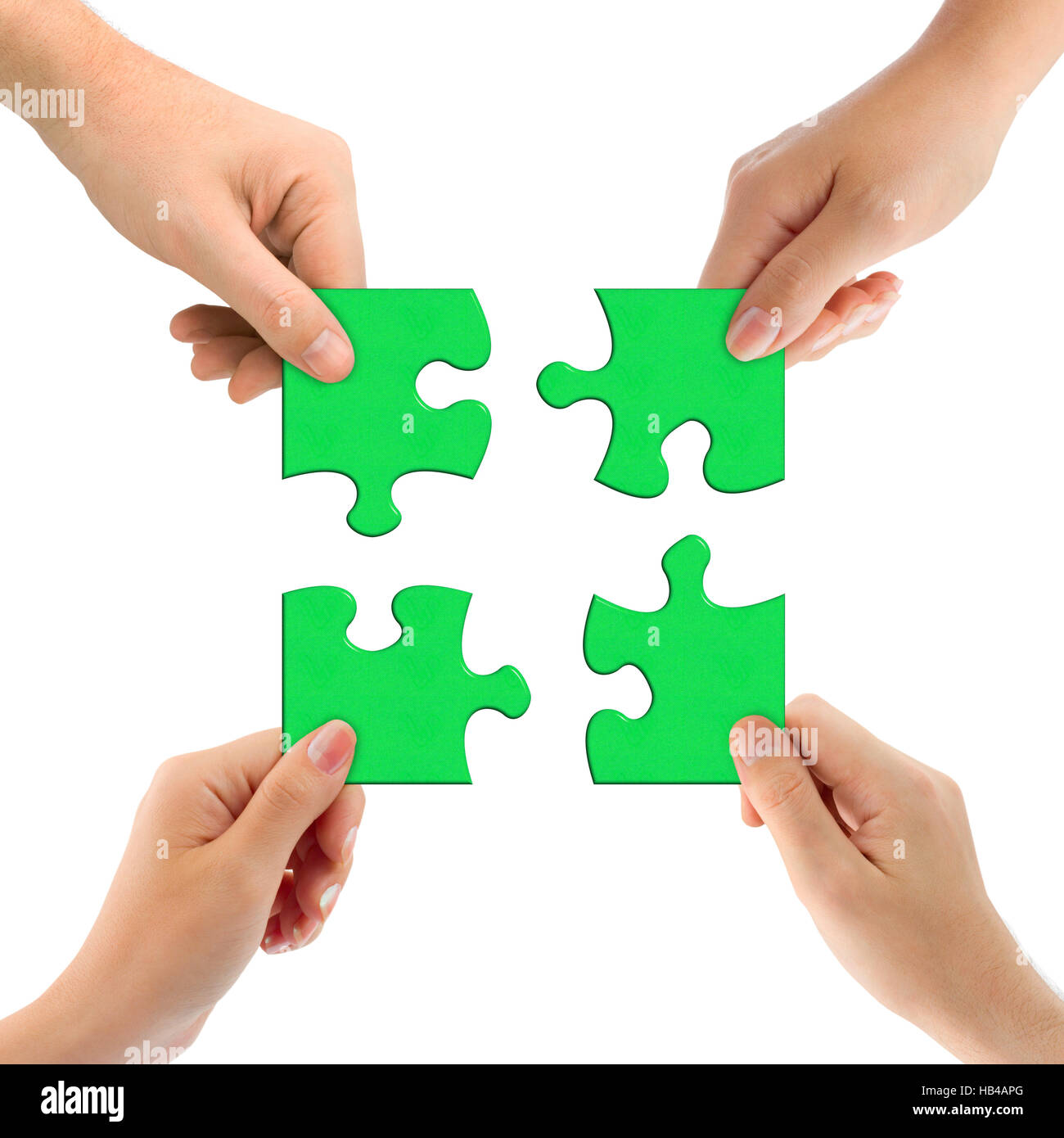 Hands and puzzle Stock Photo - Alamy