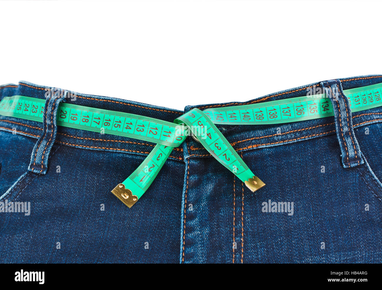 Jeans and measuring tape - slimming concept Stock Photo - Alamy