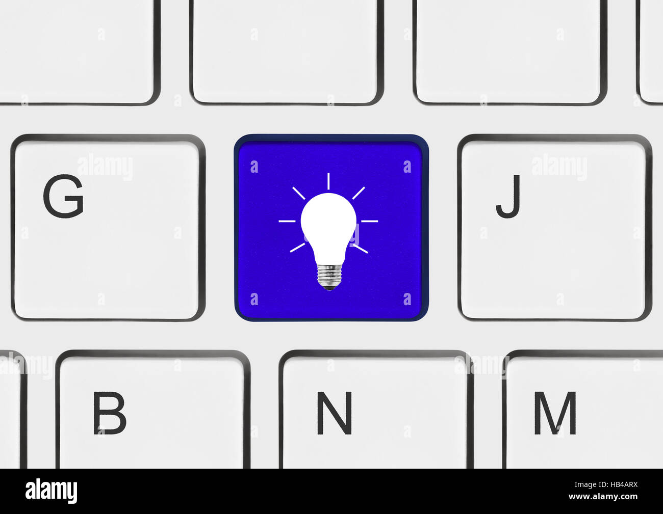 Computer keyboard with lamp key Stock Photo - Alamy