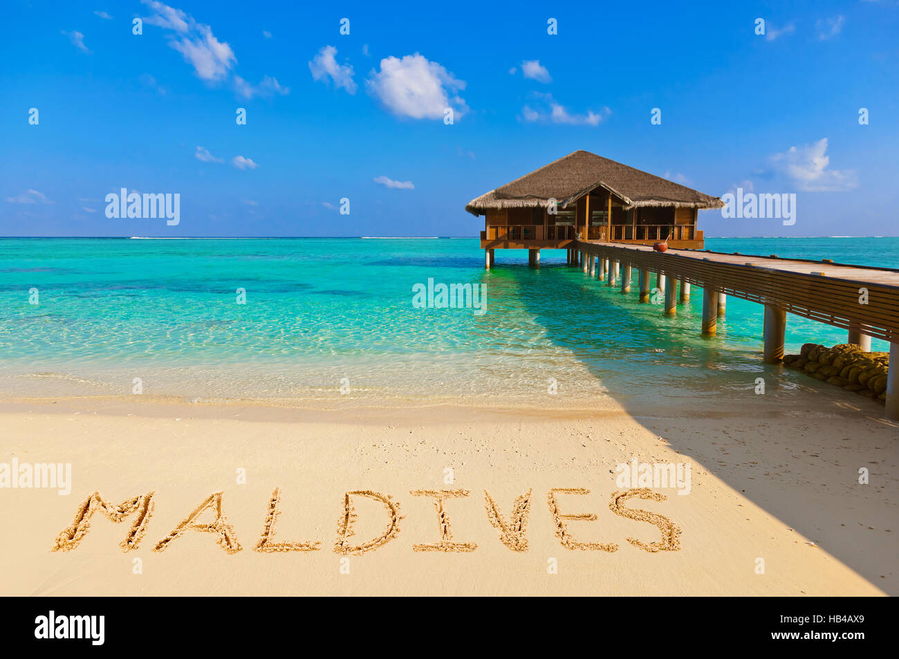 Word Maldives on beach Stock Photo - Alamy