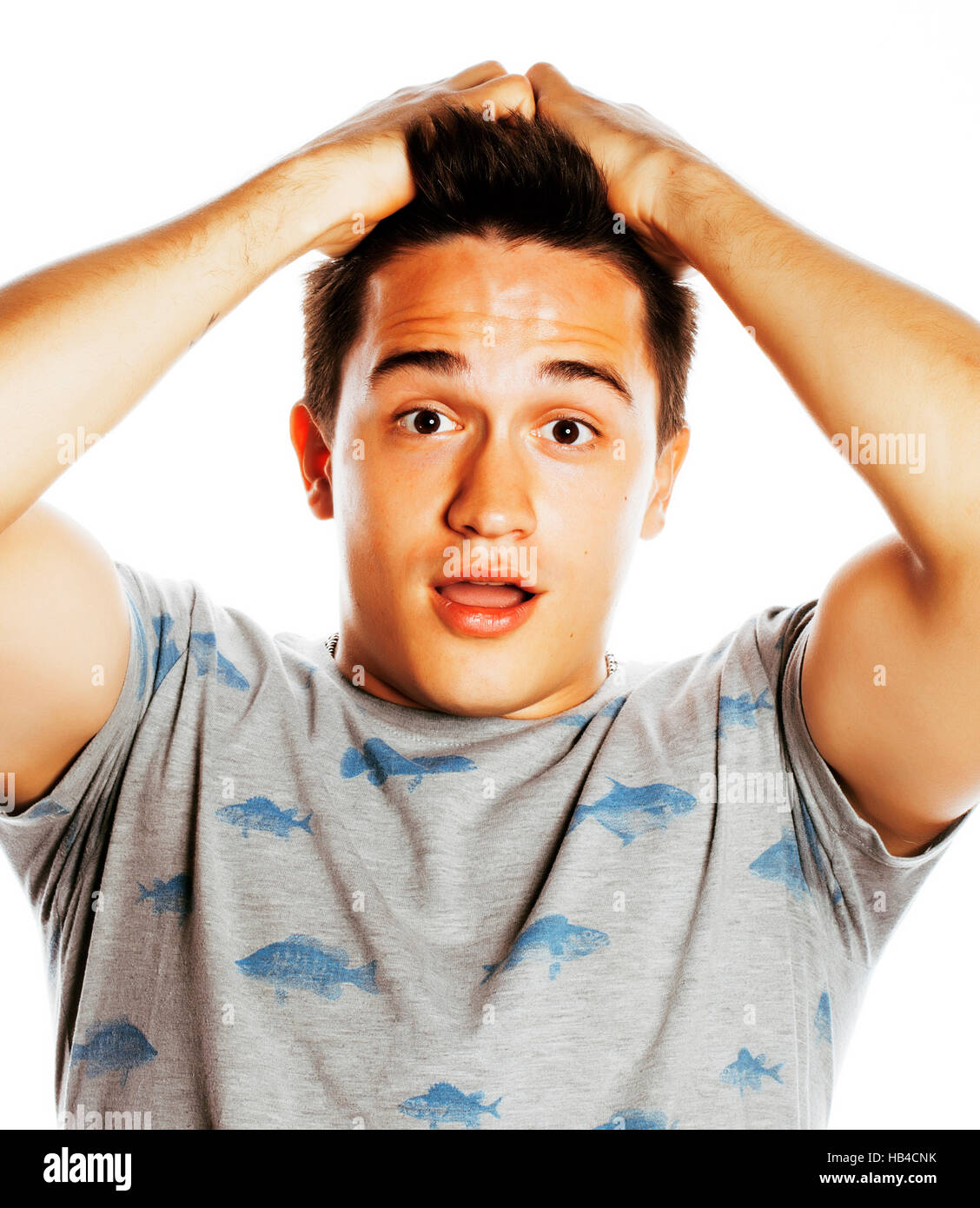 Young attractive handsome man holding hands on his head emotiona Stock ...