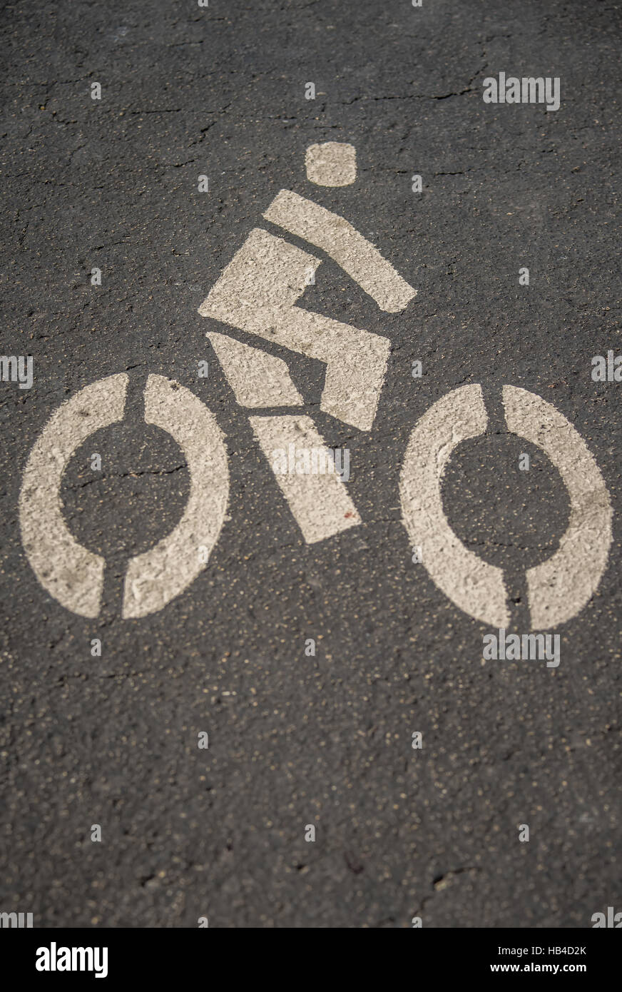 white bike sign on road Stock Photo - Alamy