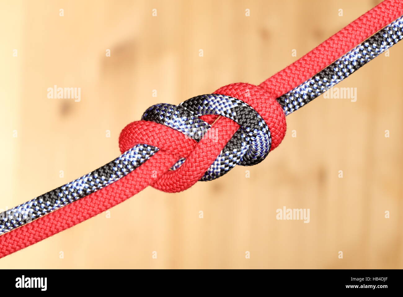 knot on wooden background Stock Photo - Alamy