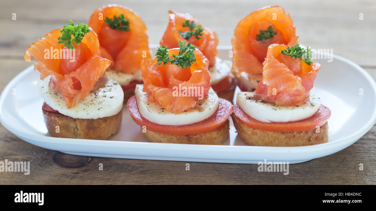 canapes with red fish Stock Photo - Alamy