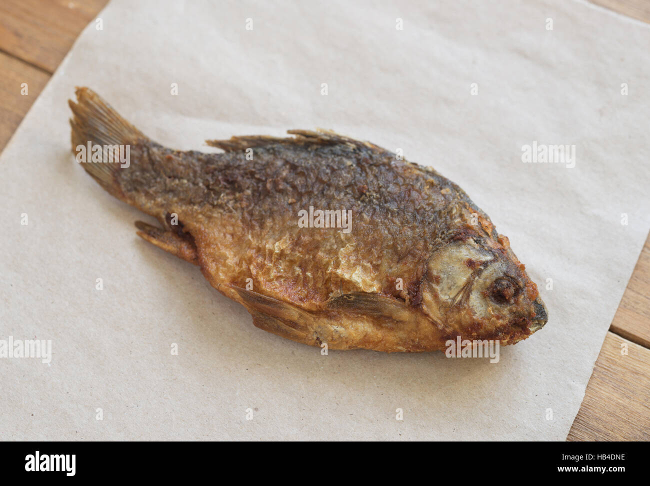 fried fish on paper Stock Photo - Alamy