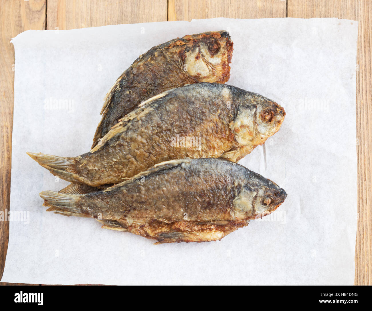 fried fish on paper Stock Photo - Alamy