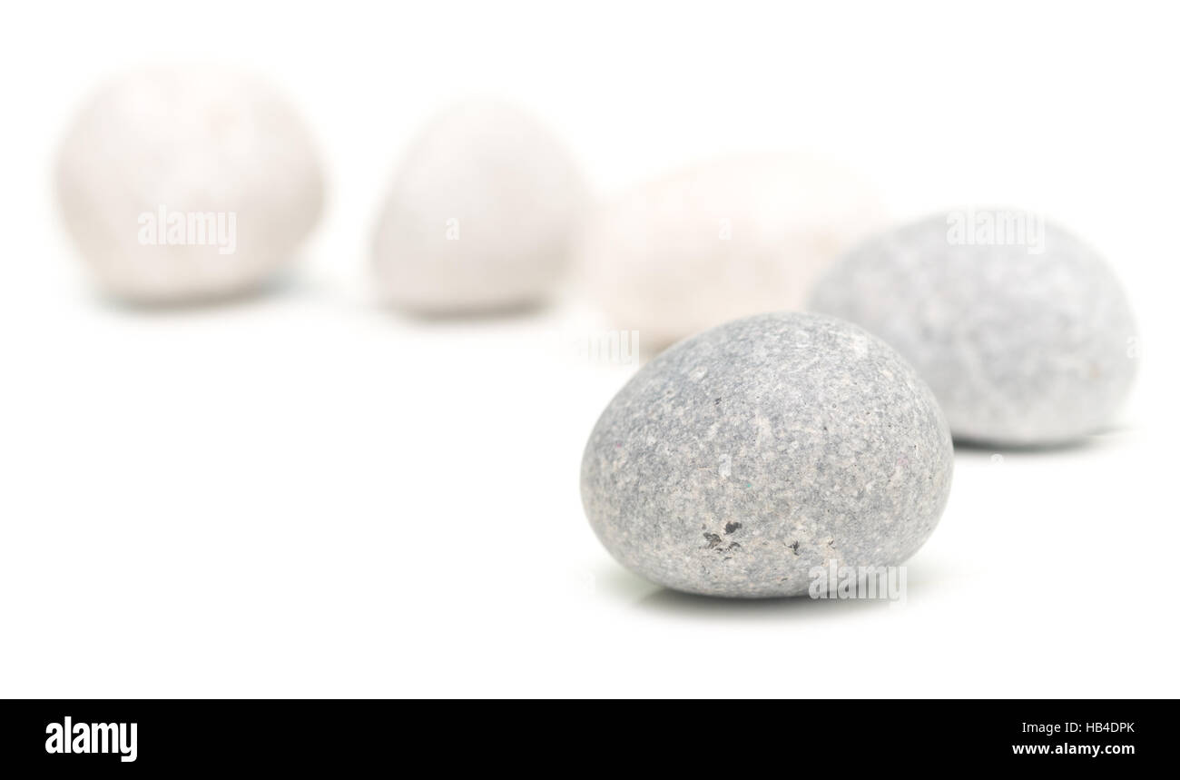 round stones on white Stock Photo - Alamy