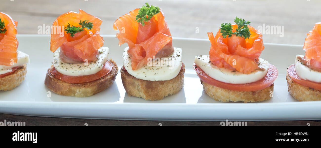 canapes with red fish Stock Photo - Alamy