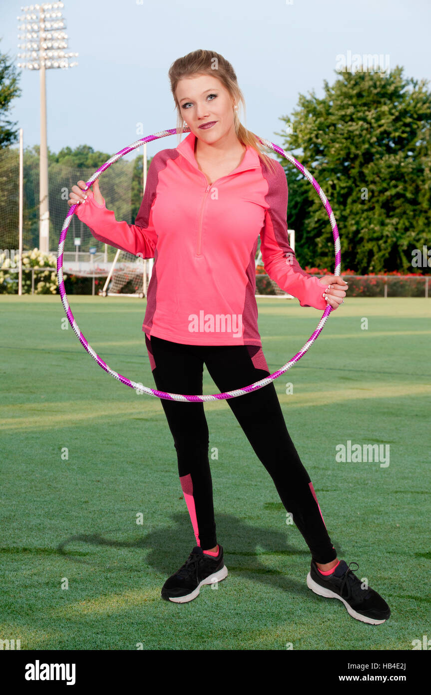 Woman with Hula Hoop Stock Photo - Alamy