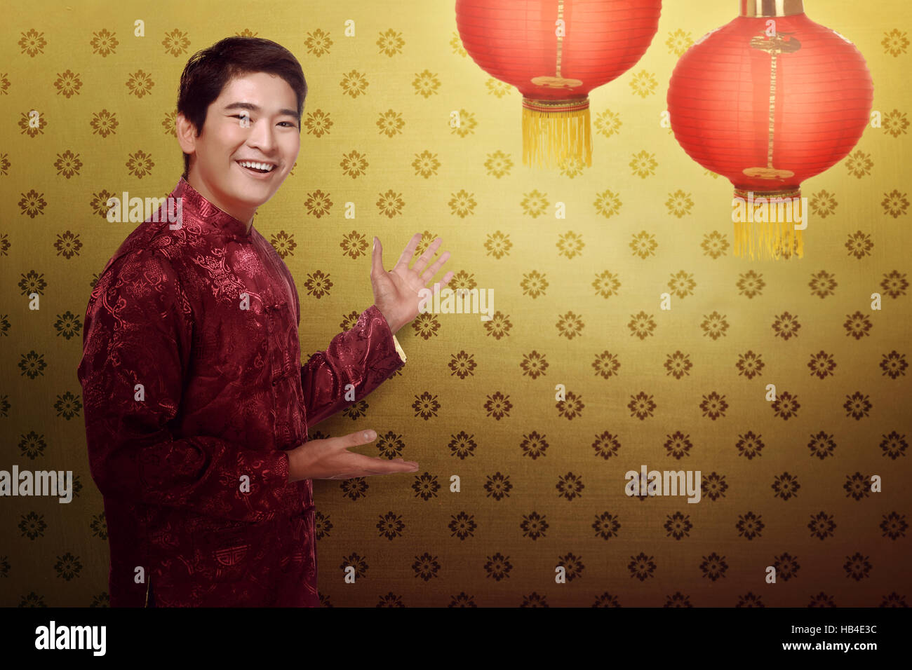 Chinese man in cheongsam suit. Chinese new year concept Stock Photo - Alamy