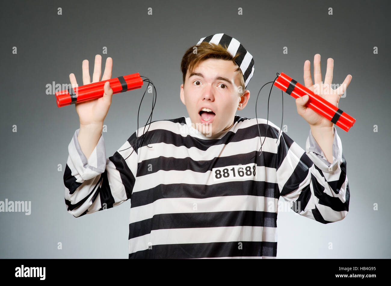 Funny prisoner in prison concept Stock Photo - Alamy