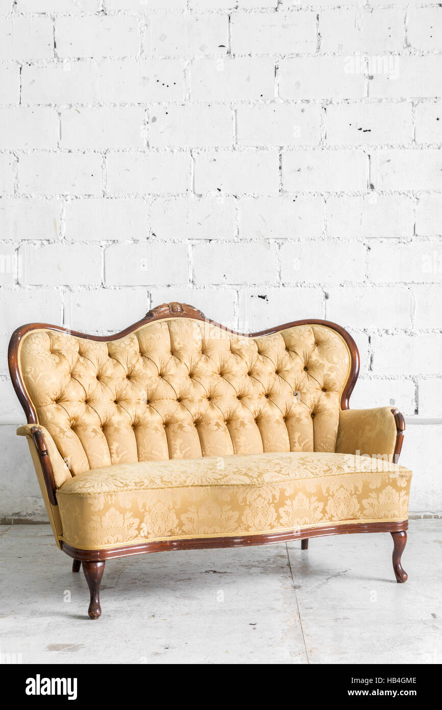 Brown Retro Sofa Stock Photo - Alamy