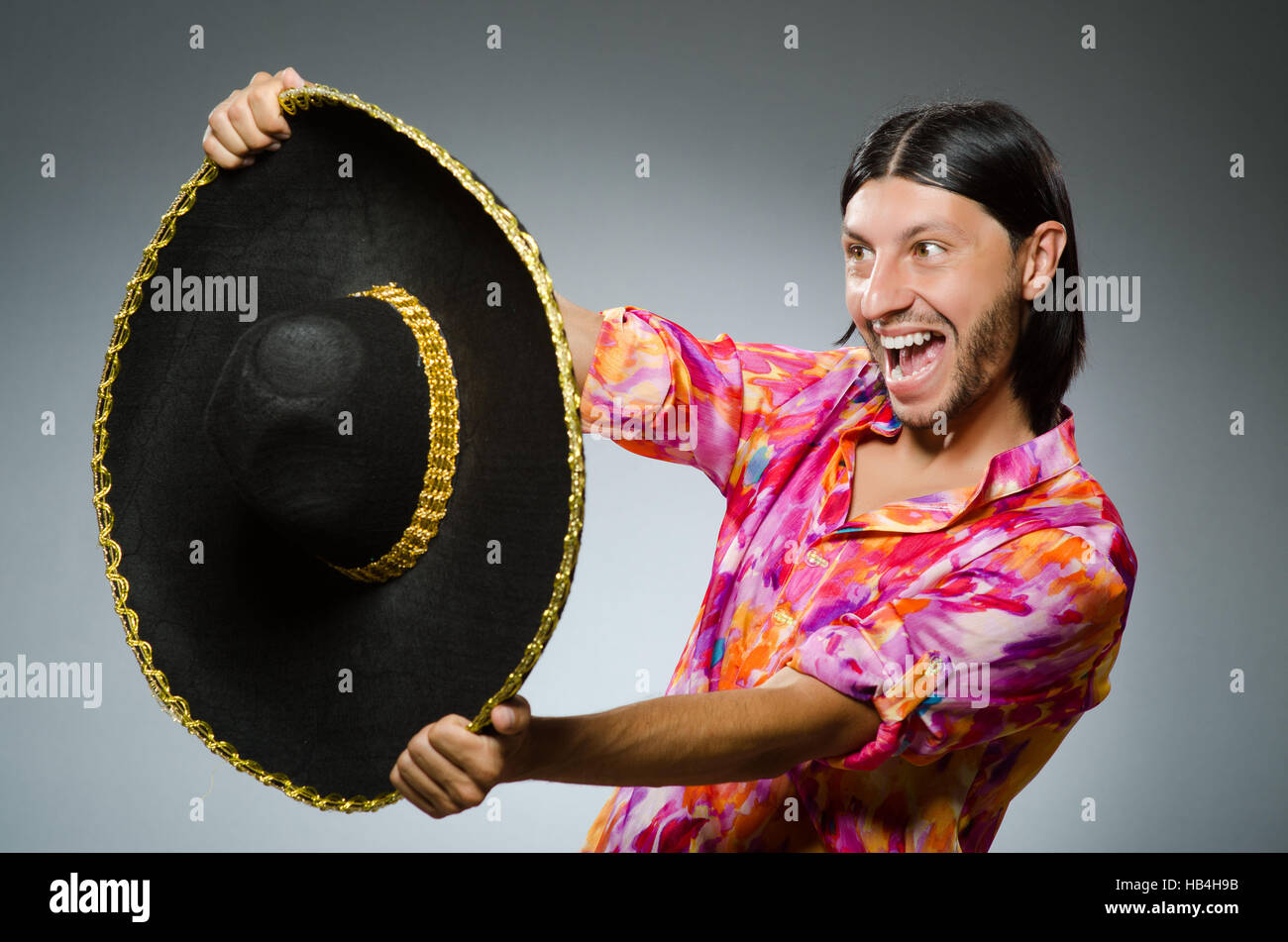 Young mexican man wearing sombrero Stock Photo - Alamy
